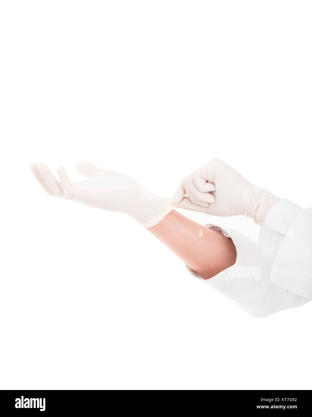 Doctor pulling on gloves Cut Out Stock Images & Pictures - Alamy