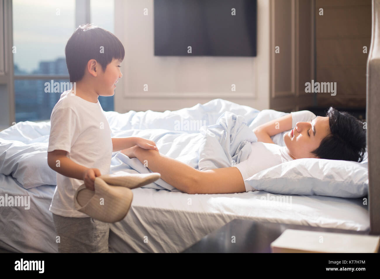 Child waking up sunlight hi-res stock photography and images - Alamy