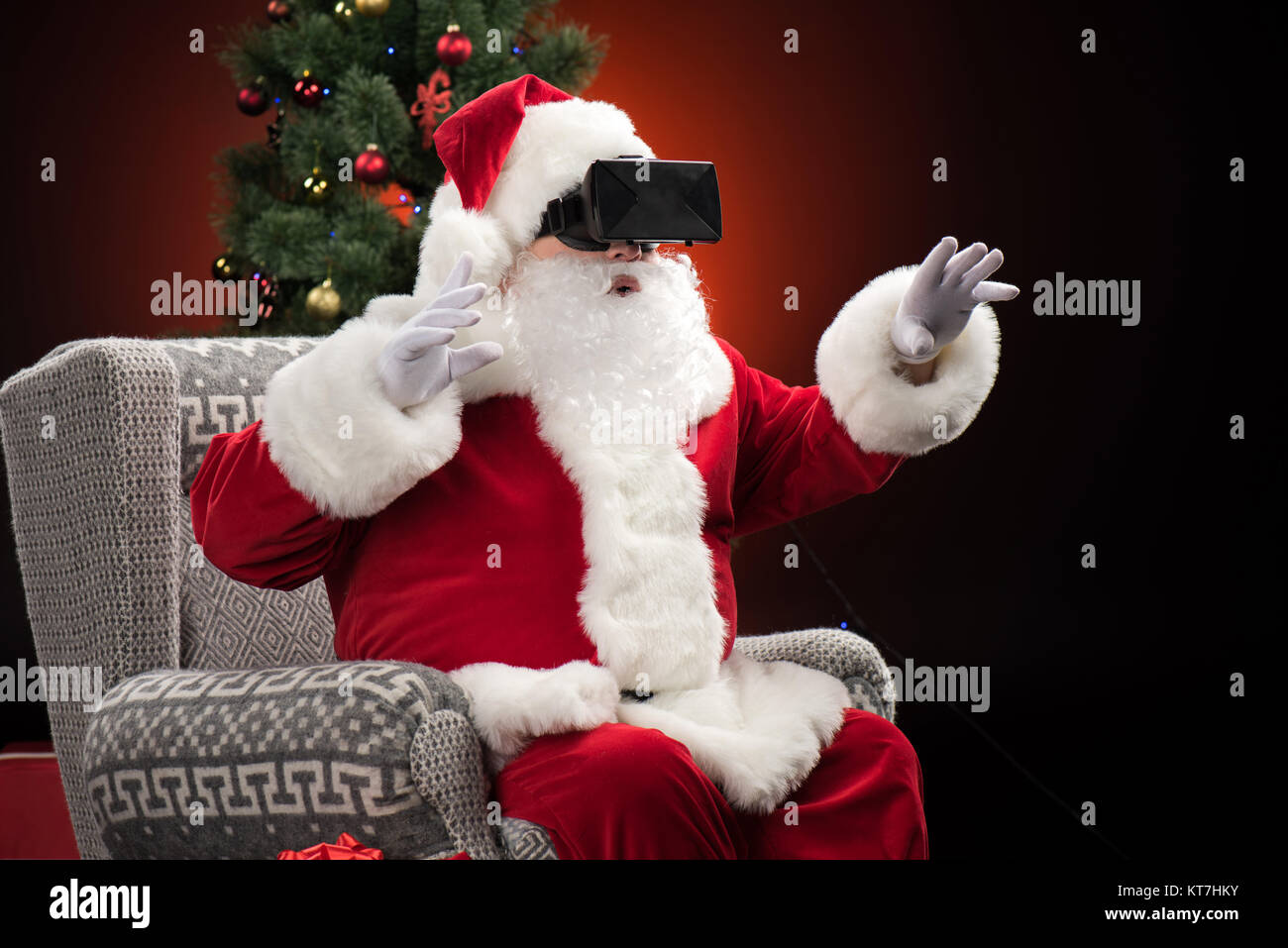Santa Claus wearing virtual reality headset Stock Photo - Alamy