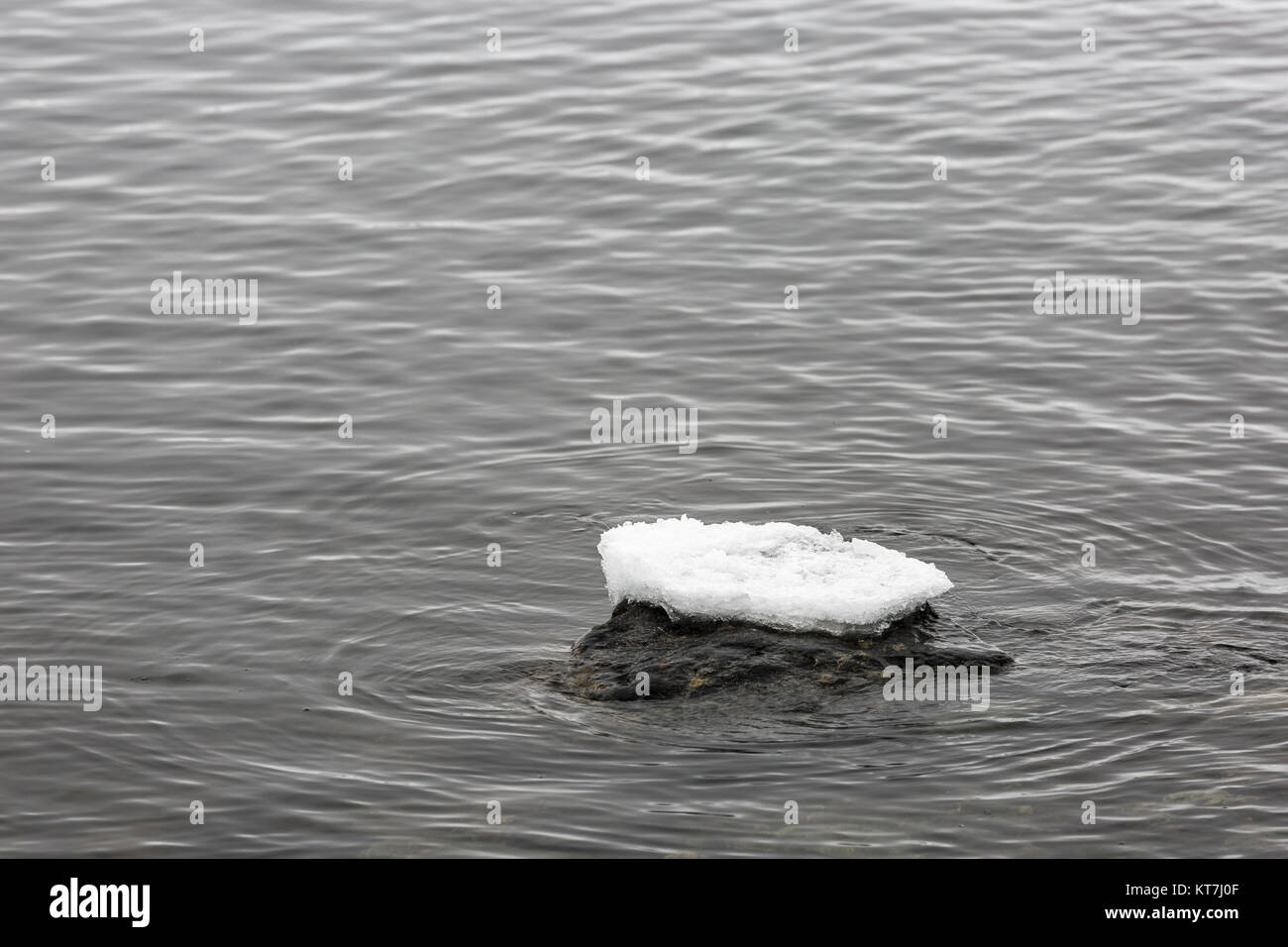 Ice on Top of Rock Stock Photo - Alamy