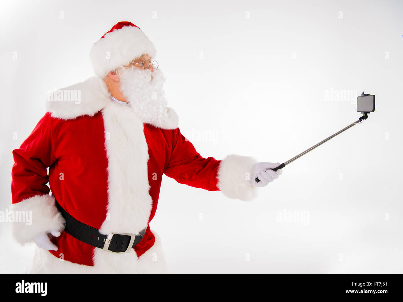 Happy Santa Claus taking selfie Stock Photo - Alamy