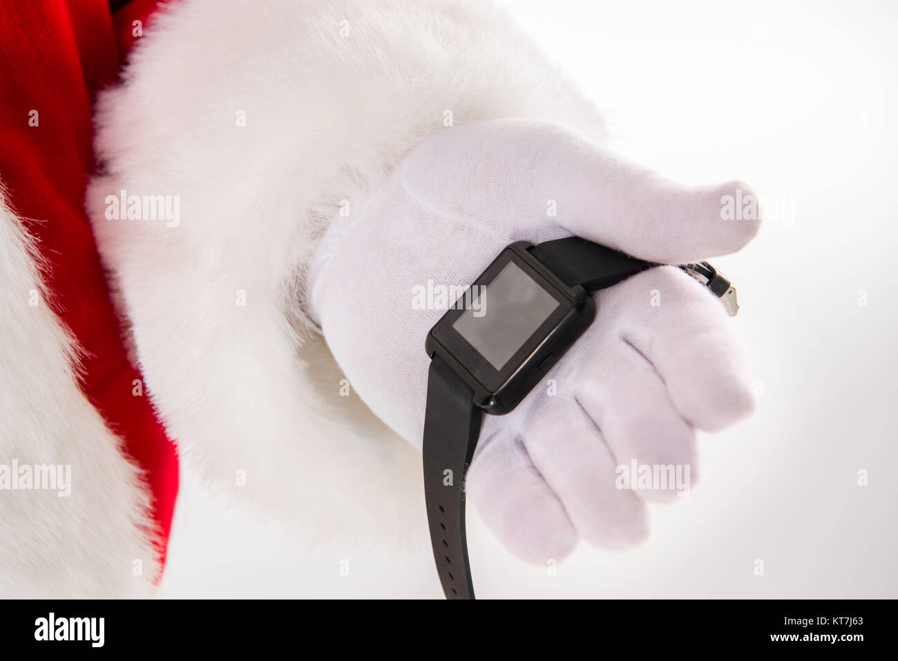 Santa Claus hand showing smart-watch Stock Photo - Alamy