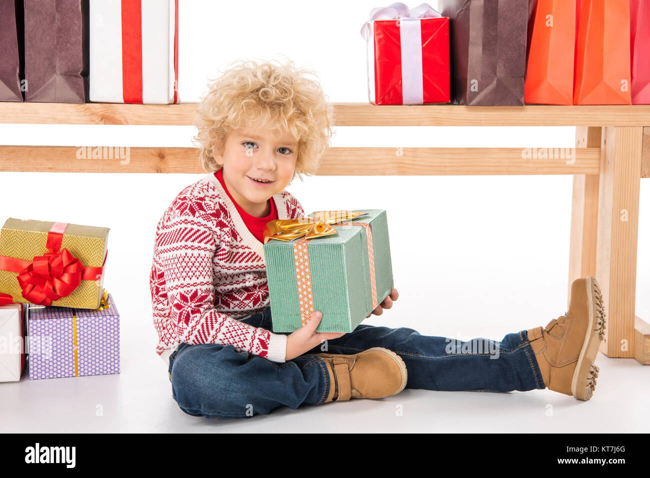 Kid with gift boxes and shopping bags Stock Photo - Alamy