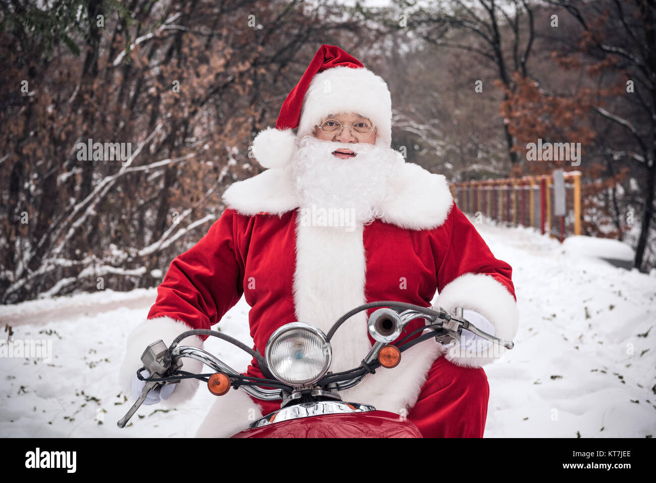 Santa claus riding moped hi-res stock photography and images - Alamy