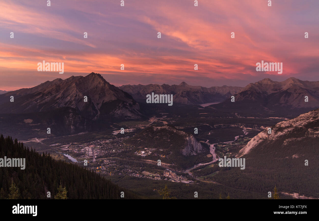 Banff at sunset seen from above with mountain surrounding it Stock ...