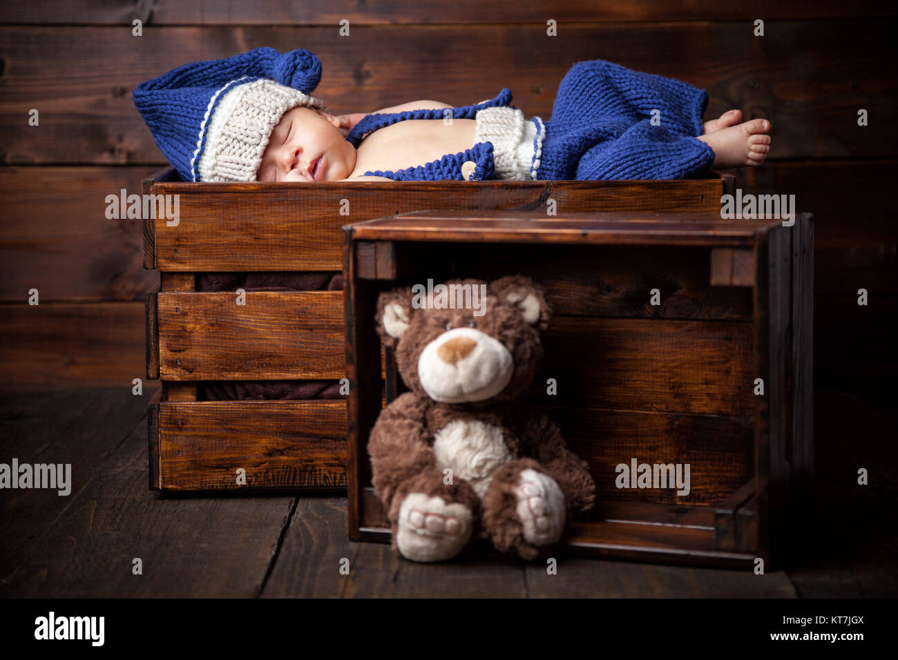 Sweet little newborn inside a wooden crate Stock Photo - Alamy