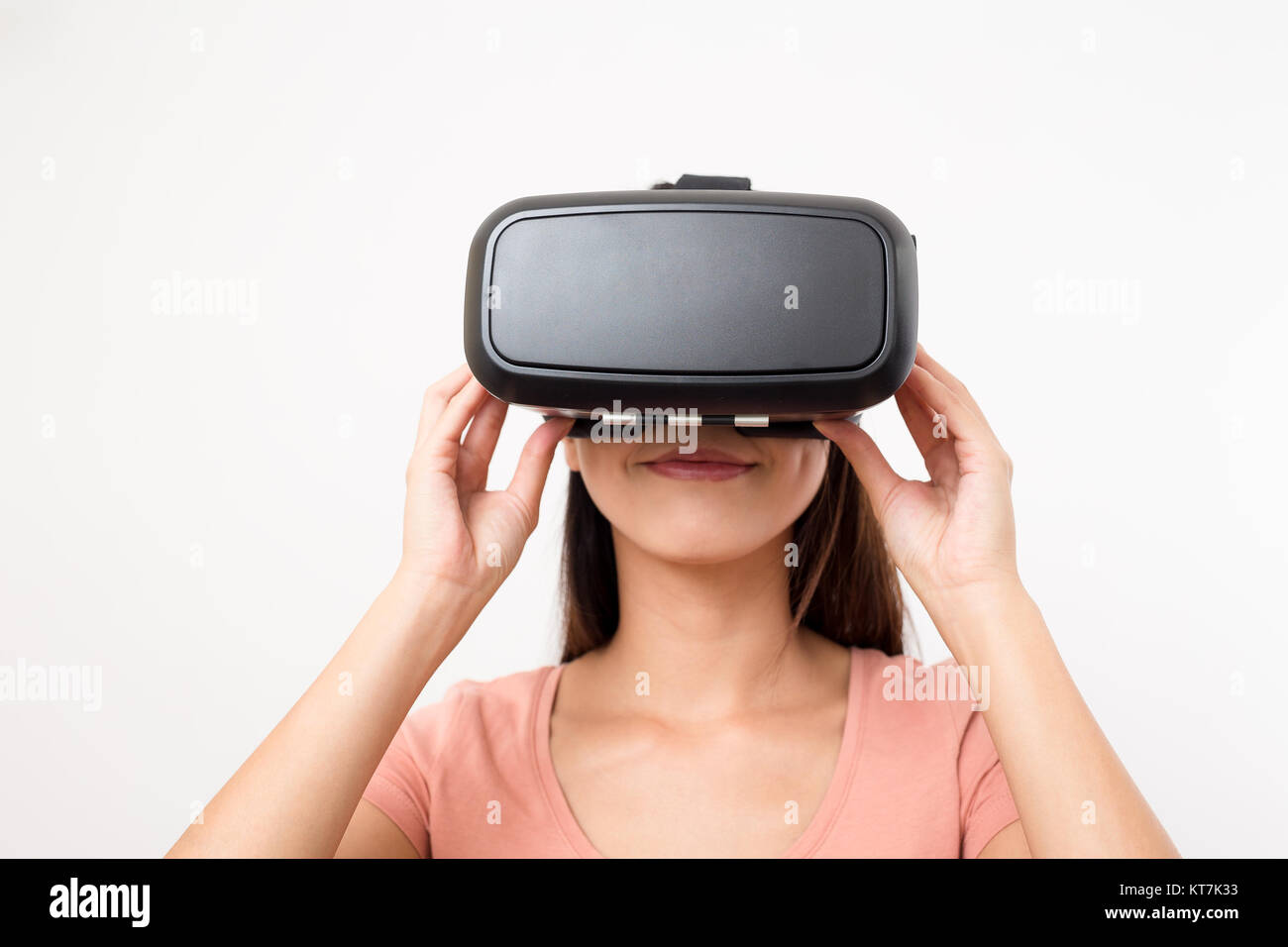 Woman using VR device Stock Photo - Alamy