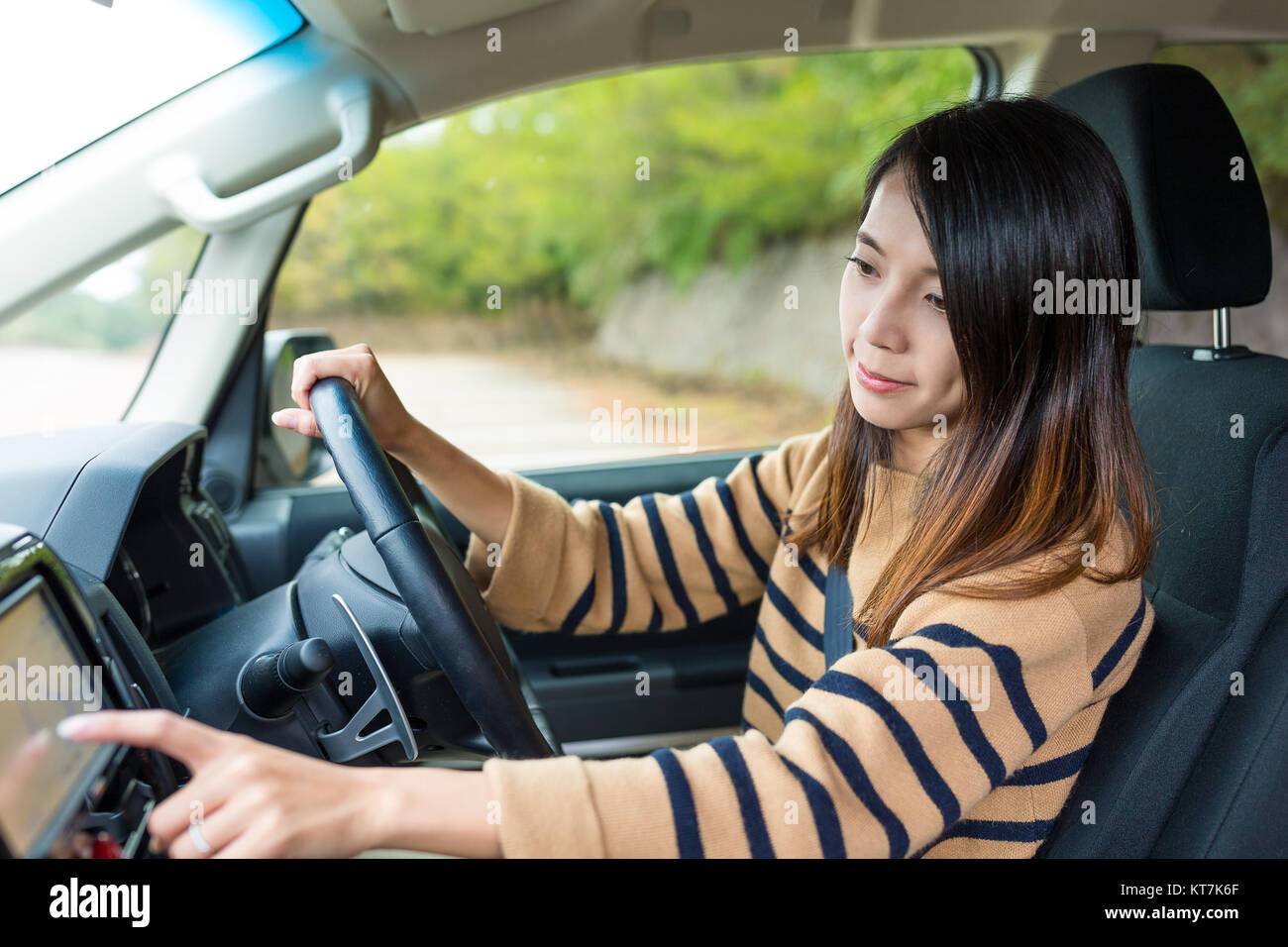 Woman checking the location on the screen Stock Photo - Alamy
