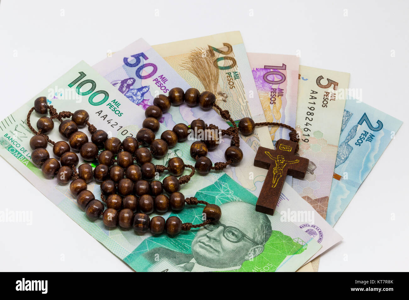 Conceptual image about money and religion Stock Photo - Alamy