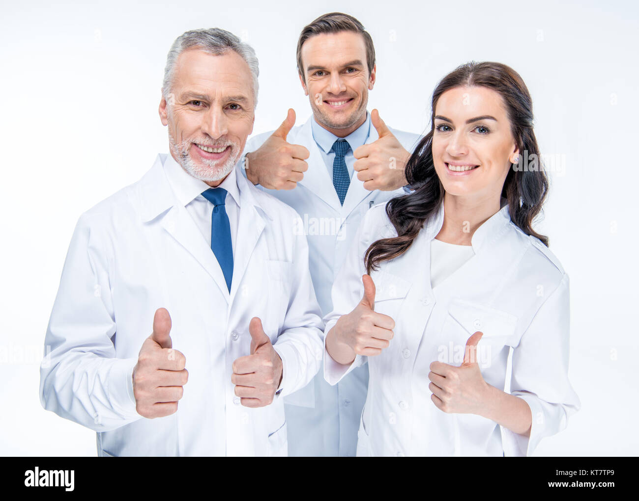 Three confident doctors Stock Photo - Alamy