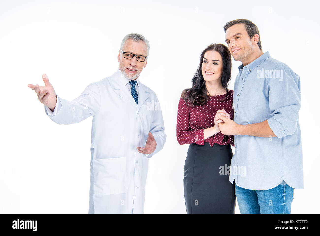 Young couple and doctor Stock Photo - Alamy