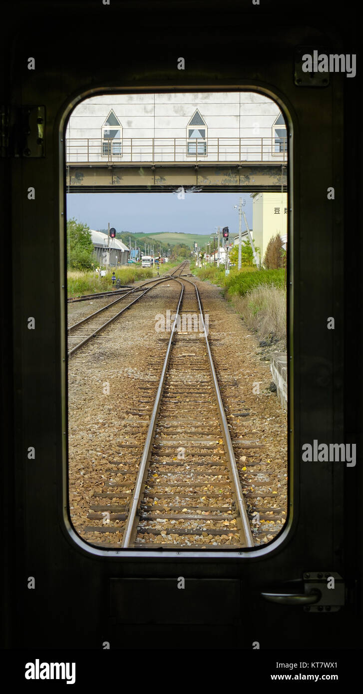 Rail track at countryside, view from window of train Stock Photo - Alamy