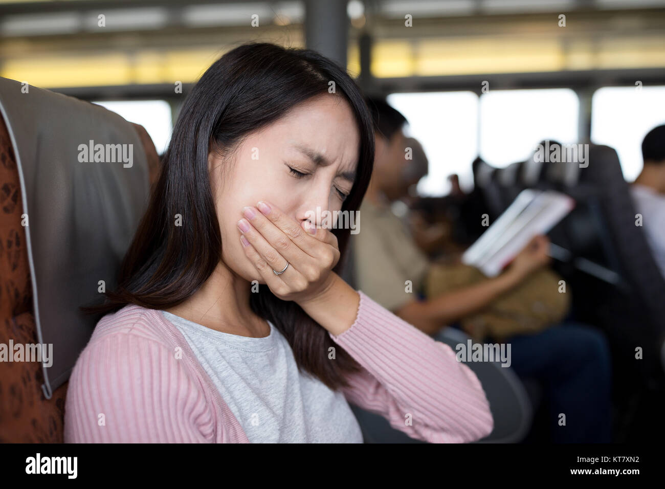 Woman suffer from seasick on boat Stock Photo - Alamy