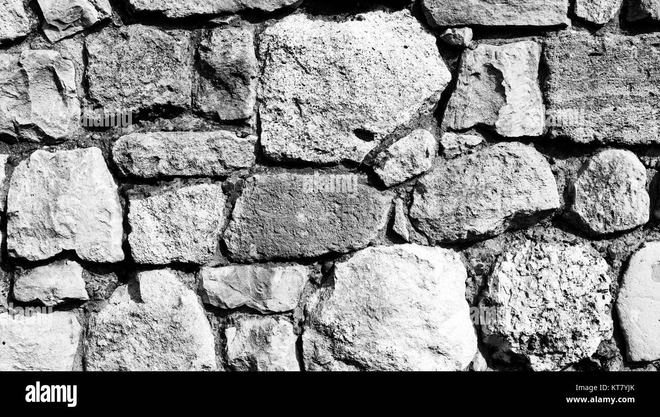 The wall made of stone Stock Photo - Alamy