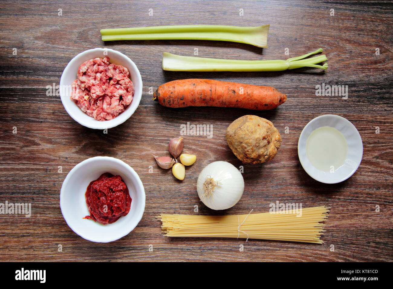 Ingredients for spaghetti bolognese on wooden background Stock Photo ...