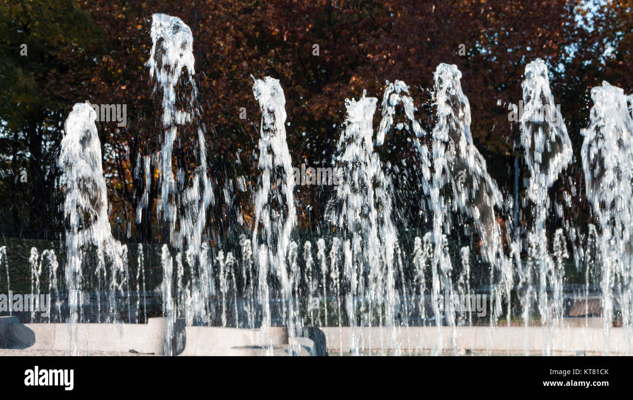 Fountain Splashing Water In The Park Stock Photo - Alamy