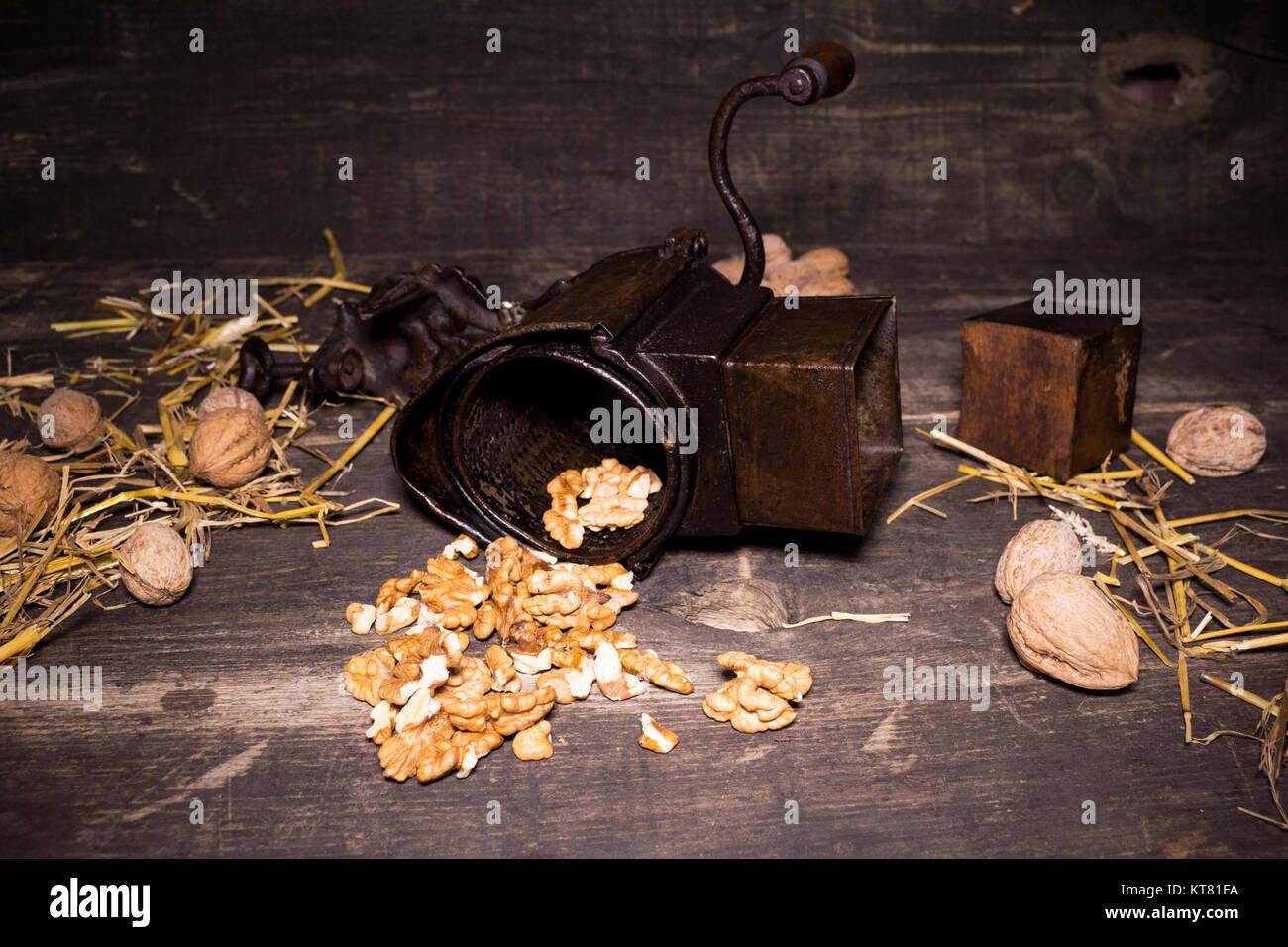 Walnuts and hand walnuts grinder Stock Photo - Alamy