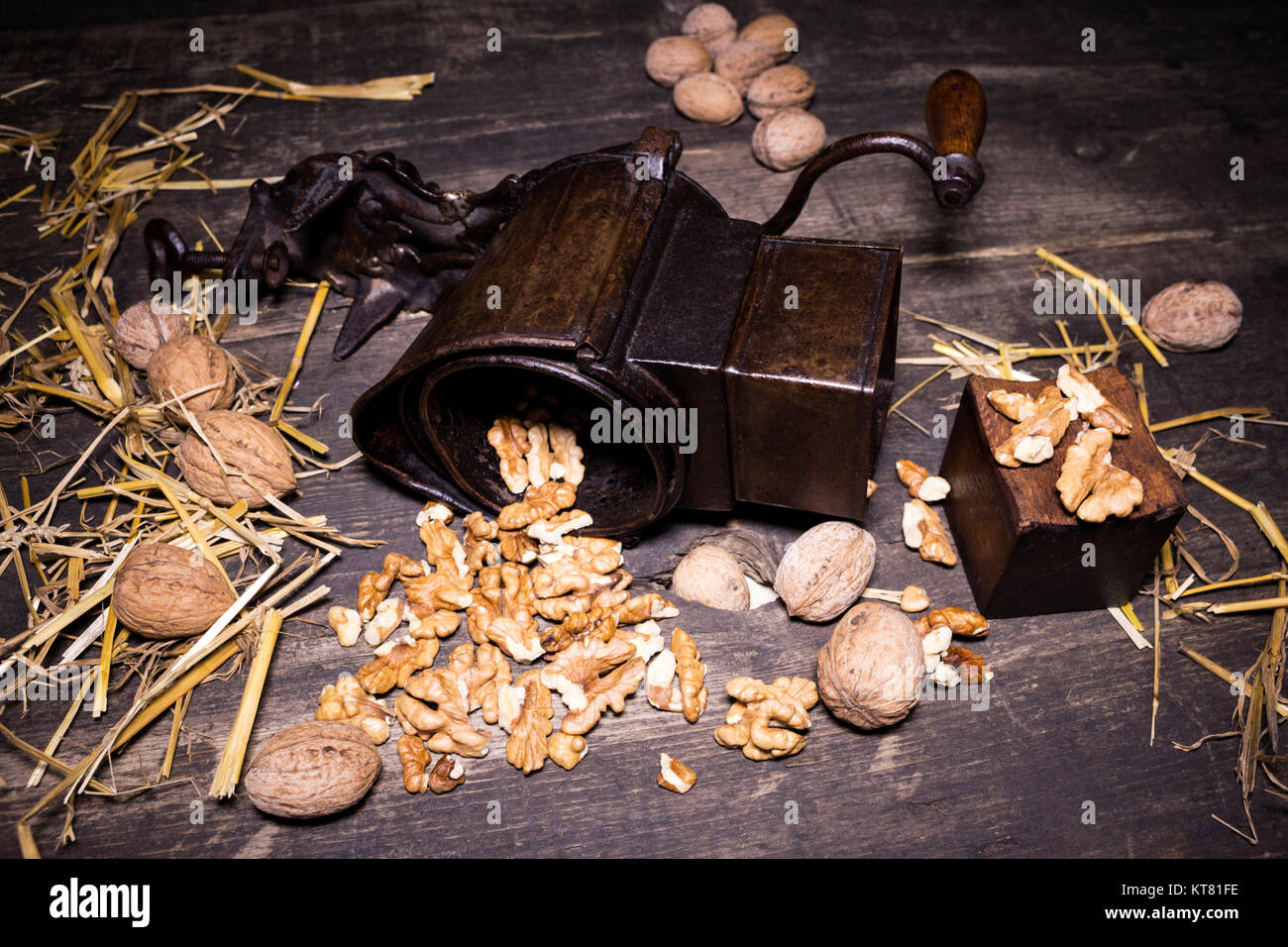 Walnuts and hand walnuts grinder Stock Photo - Alamy