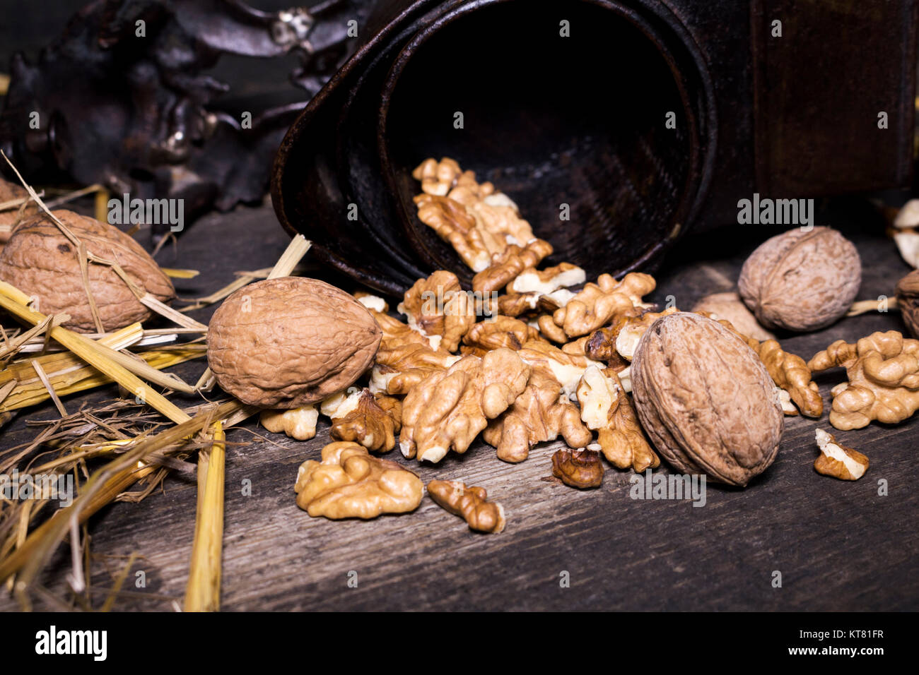 Walnuts and hand walnuts grinder Stock Photo - Alamy