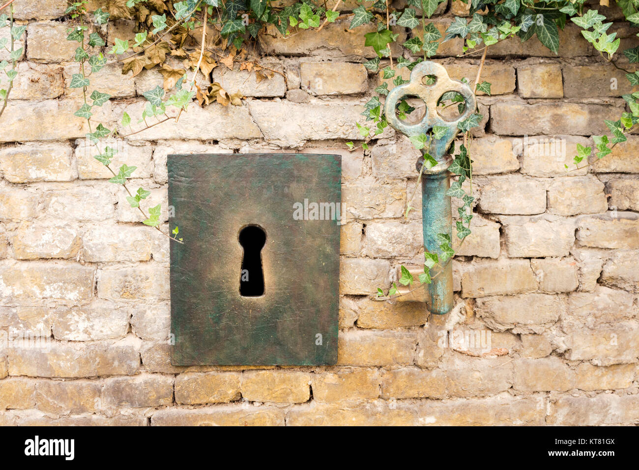Vintage Giant Key And Keyhole Stock Photo - Alamy