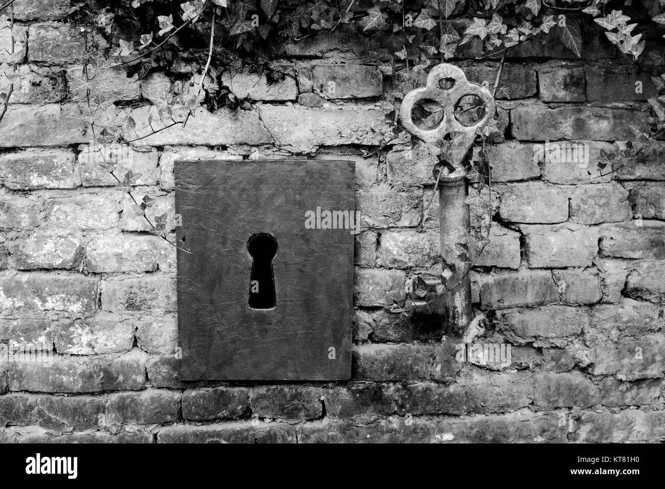 Vintage Giant Key And Keyhole Stock Photo - Alamy