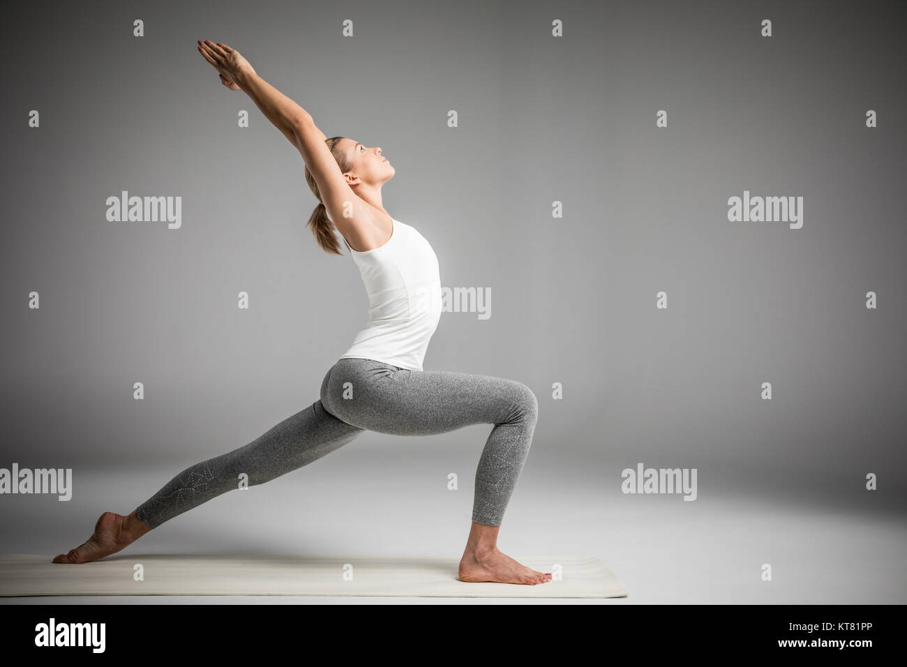 Woman standing in yoga position Stock Photo - Alamy