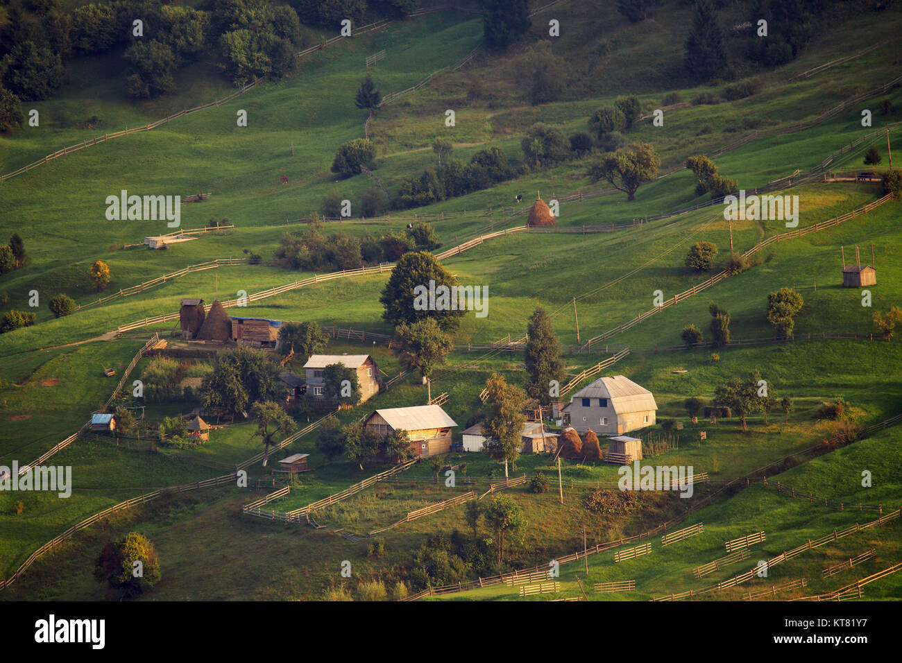September rural scene in mountains. Authentic village and fence Stock ...