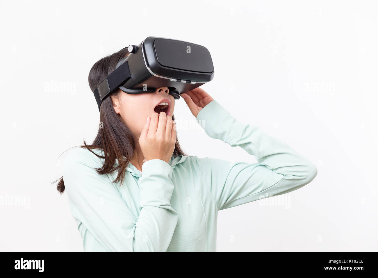 Woman feeling horrible with virtual reality device Stock Photo - Alamy