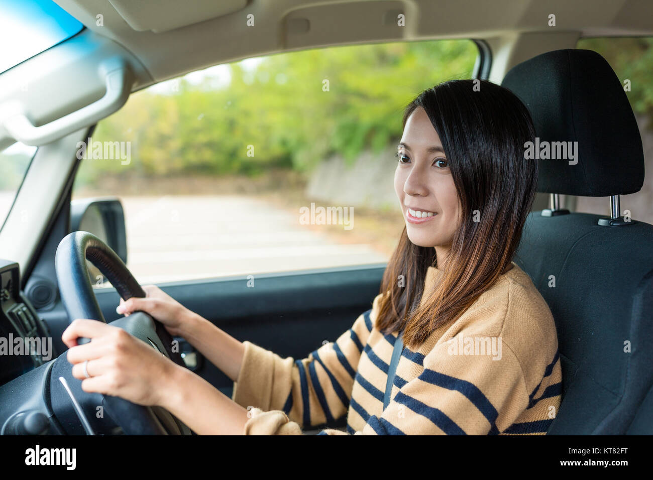 Woman driving a car Stock Photo - Alamy