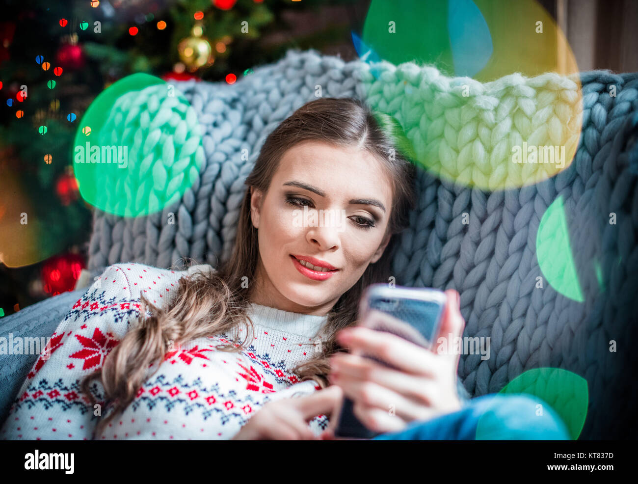 Beautiful woman using smartphone Stock Photo - Alamy