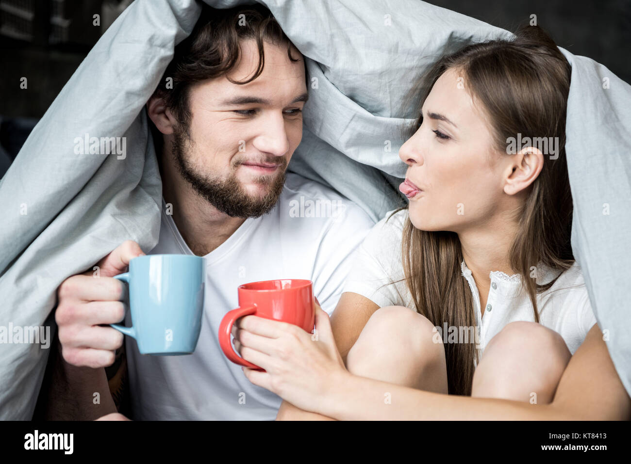 Couple drinking tea Stock Photo - Alamy