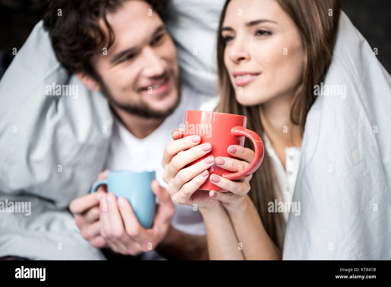 Couple drinking tea Stock Photo - Alamy