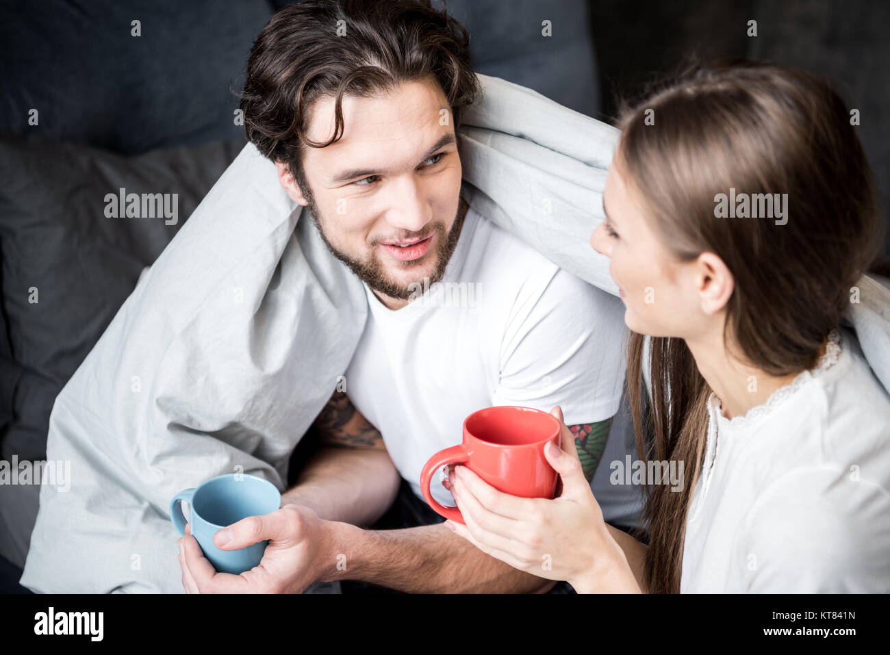 Couple drinking tea Stock Photo - Alamy