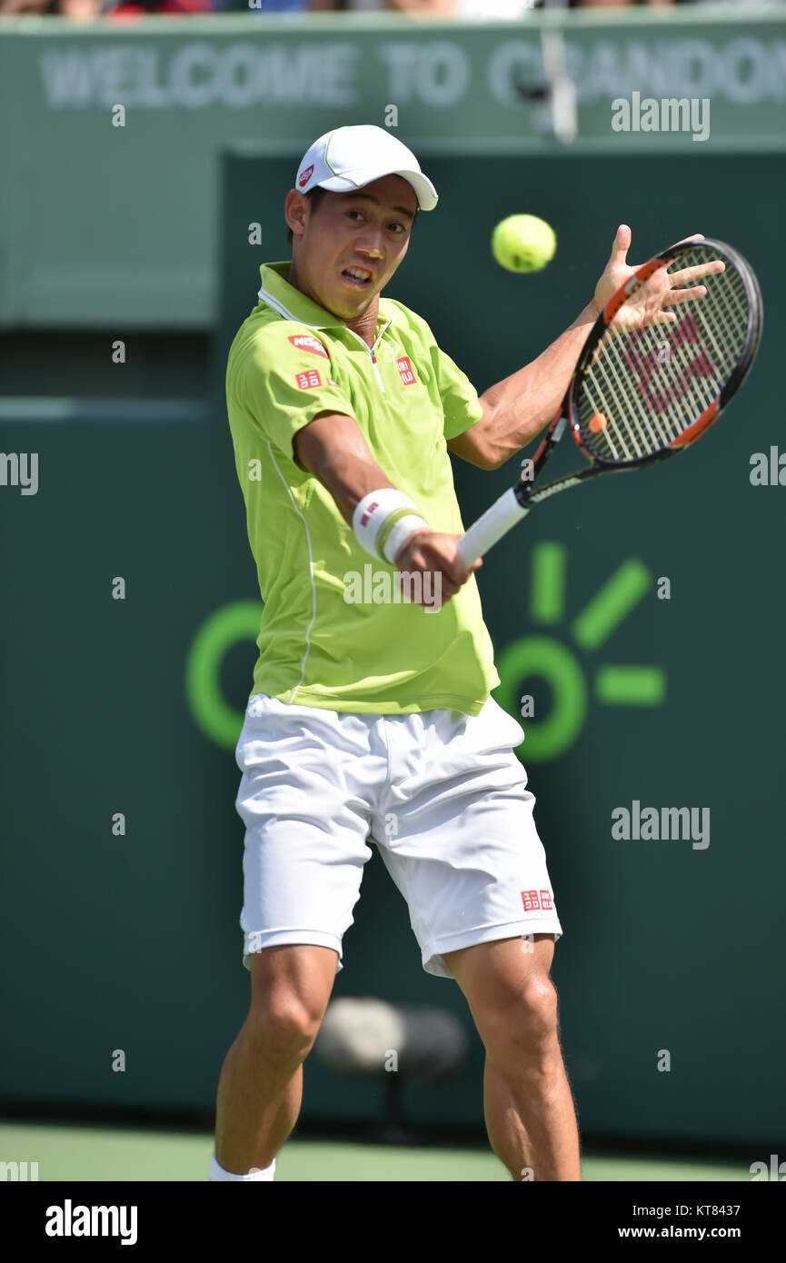 KEY BISCAYNE, FL - APRIL 02: John Isner defeats Kei Nishikori of Japan ...