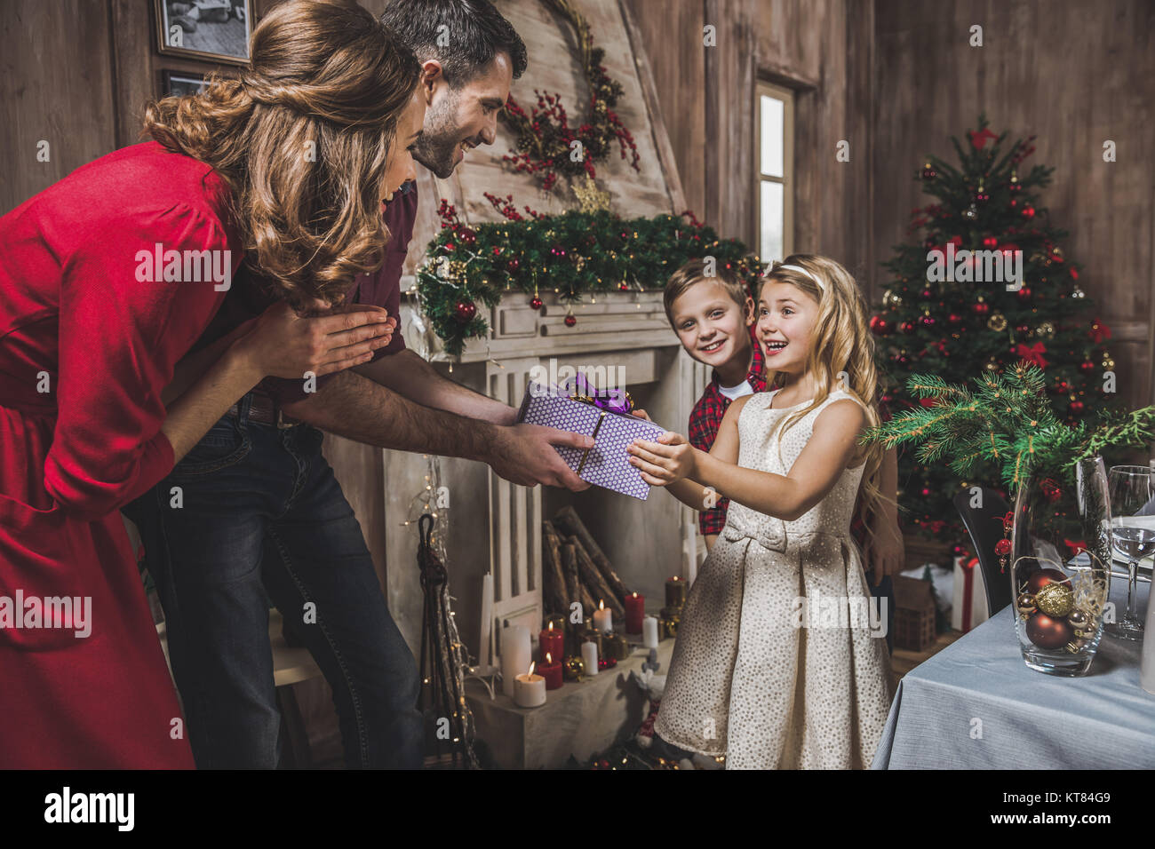 Girl receiving present Stock Photo - Alamy