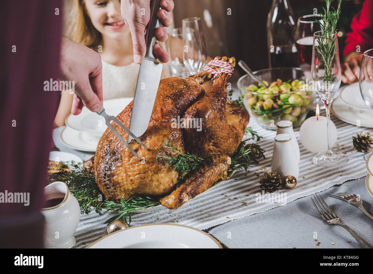 Man carving roasted turkey Stock Photo - Alamy
