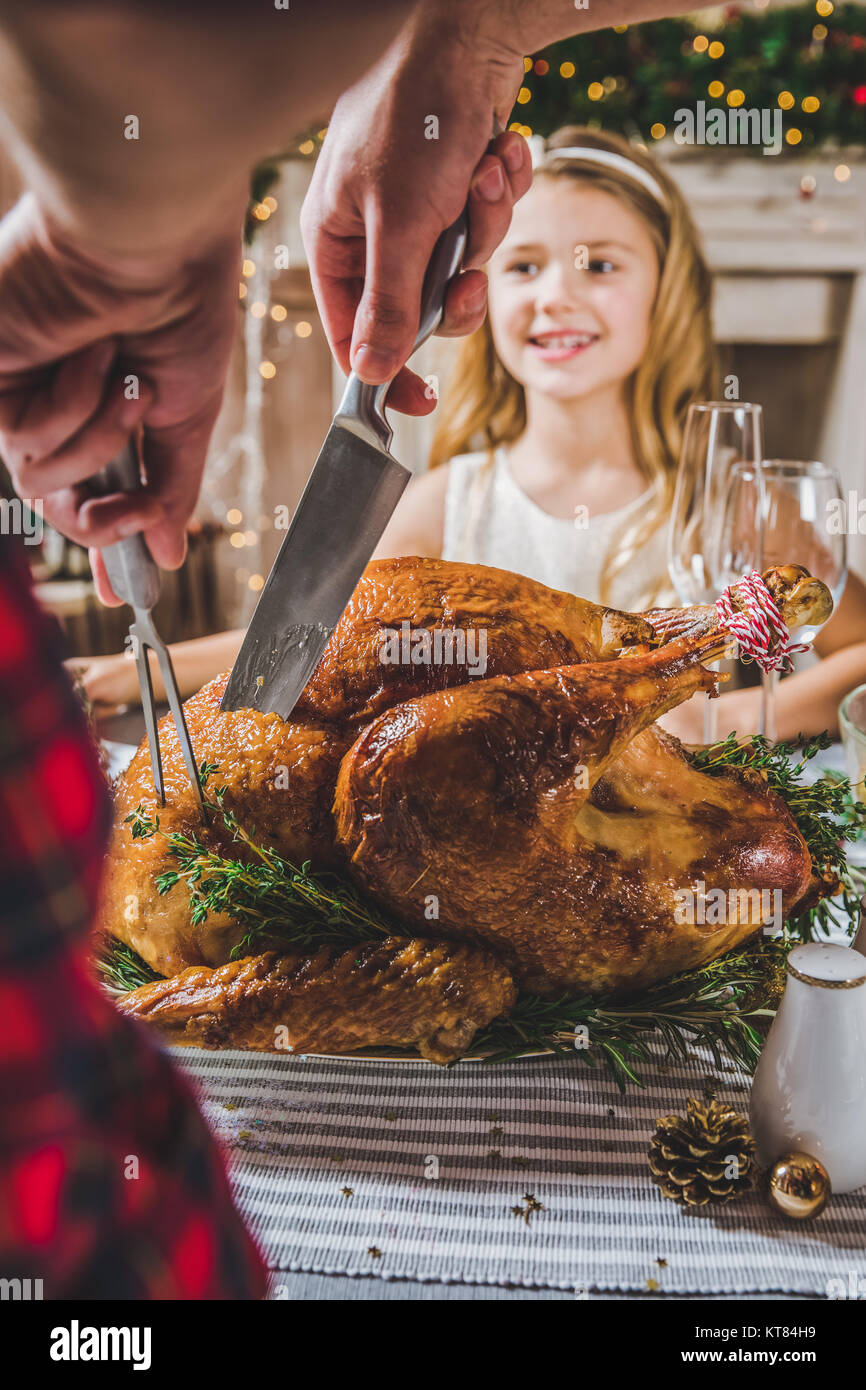 Man carving roasted turkey Stock Photo - Alamy