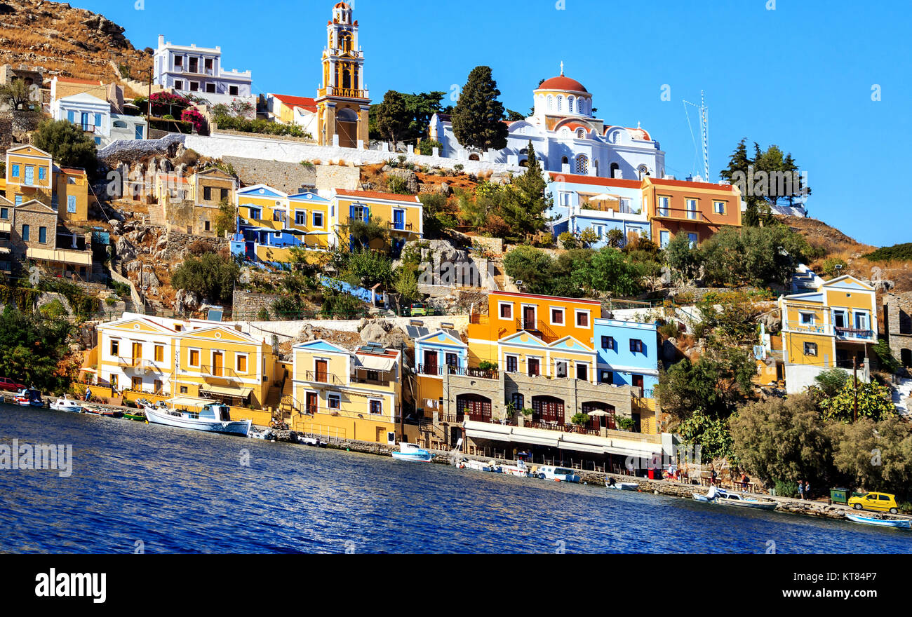 picturesque colorful houses and monastery panormitis on the greek ...
