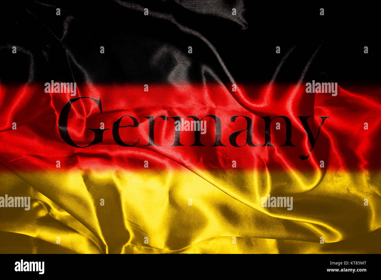German flag blowing in the wind Stock Photo - Alamy