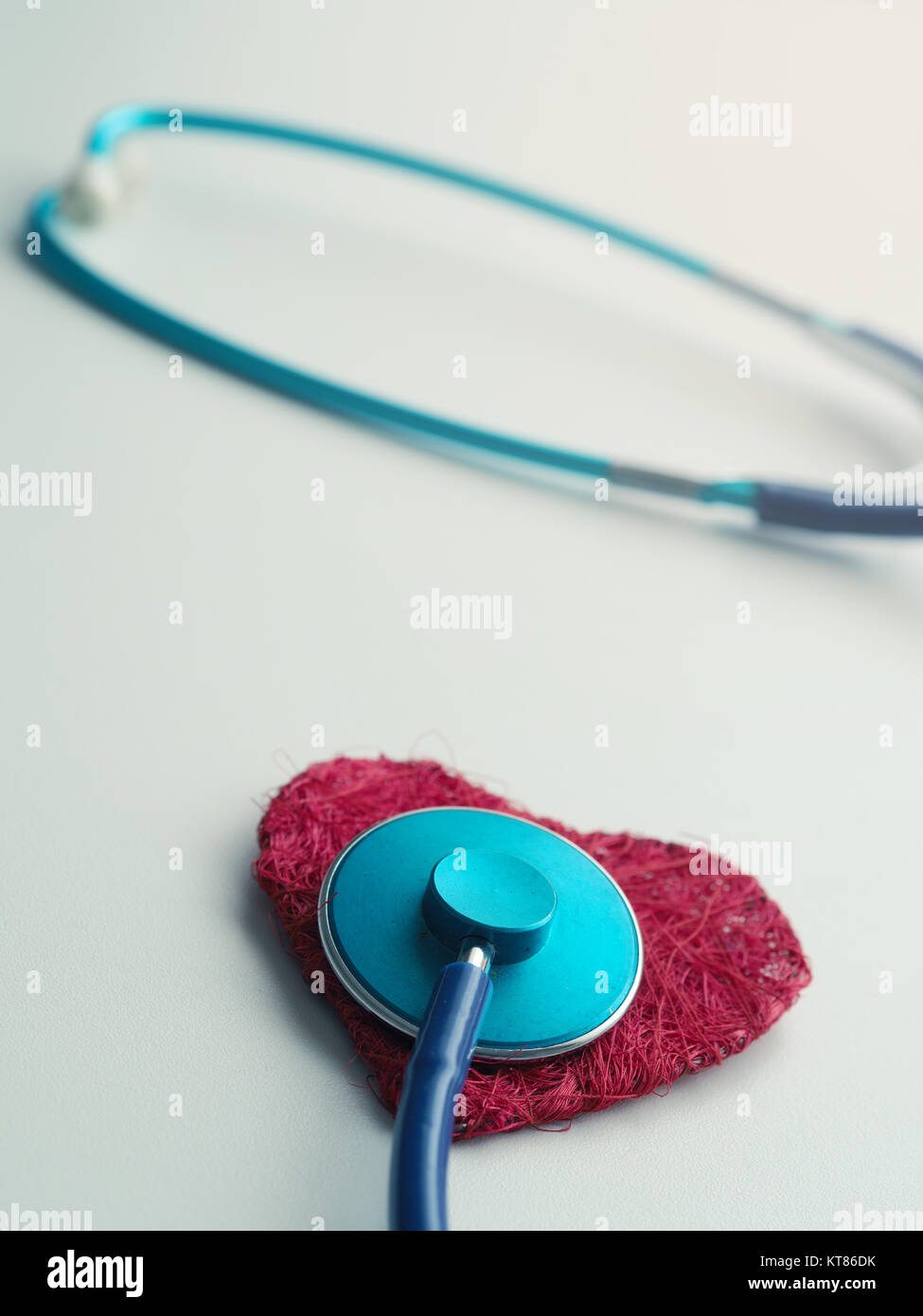 Medical or health care concept with a red heart shape and stethoscope ...