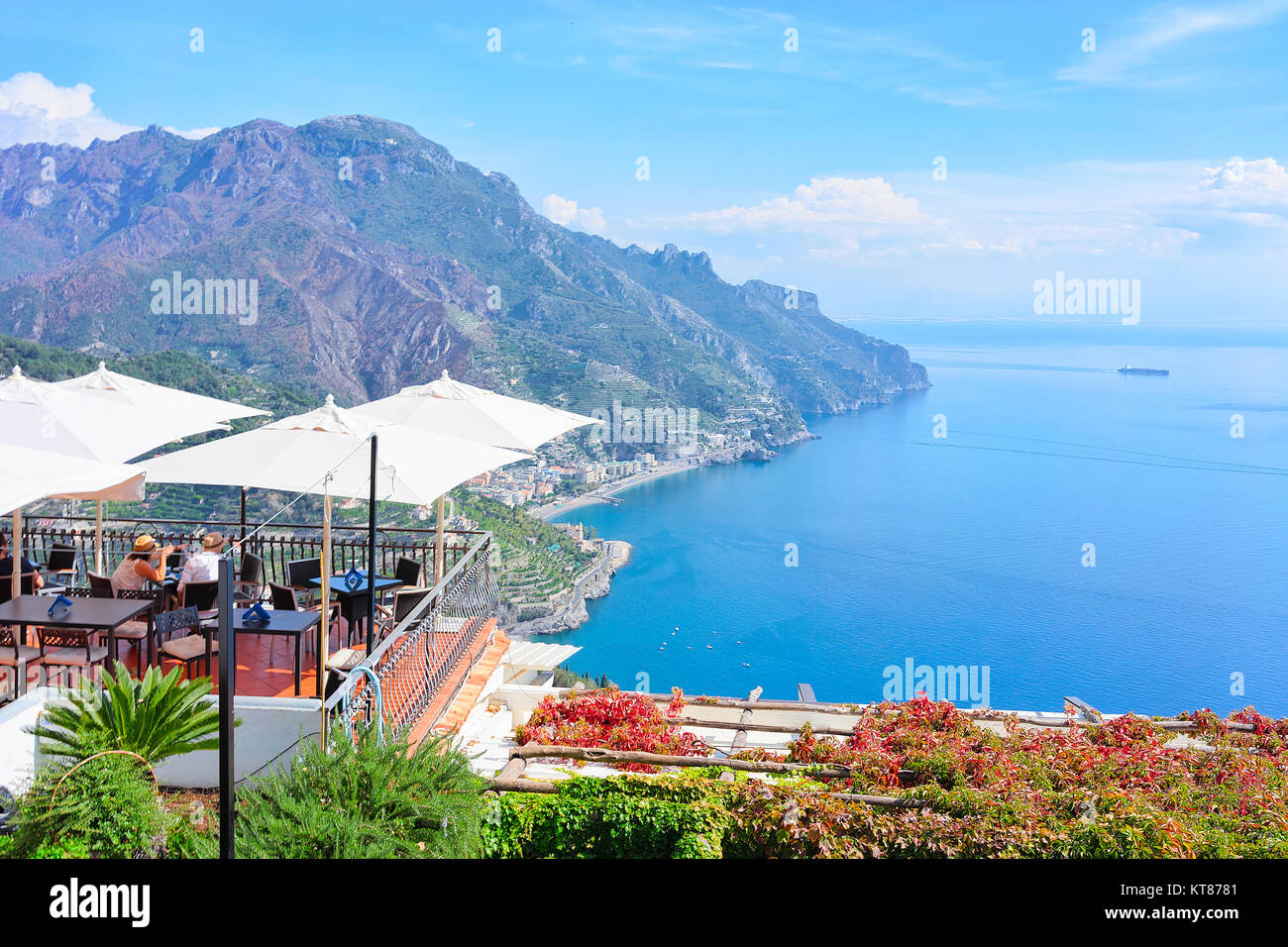 Open air street restaurant with umbrellas in Ravello village ...