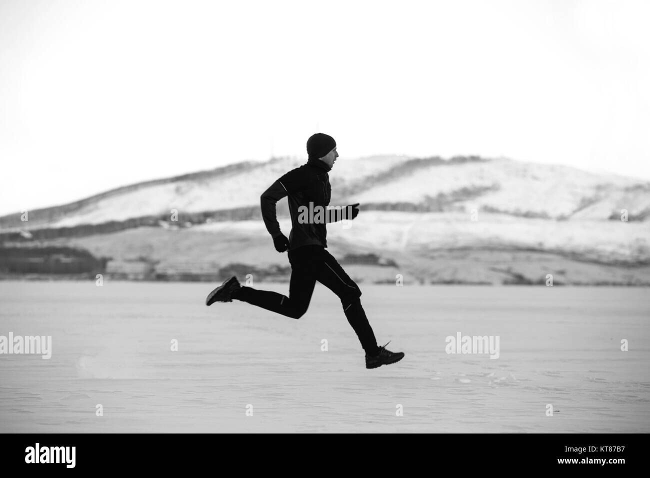 Leg trail runner man running Black and White Stock Photos & Images - Alamy