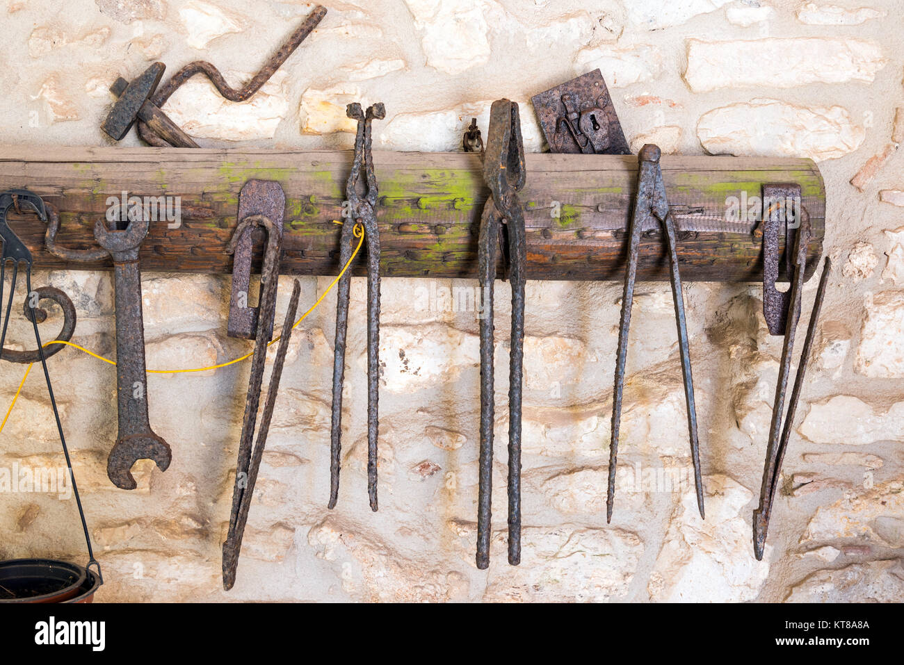 rusty old tools in a former workshop Stock Photo - Alamy
