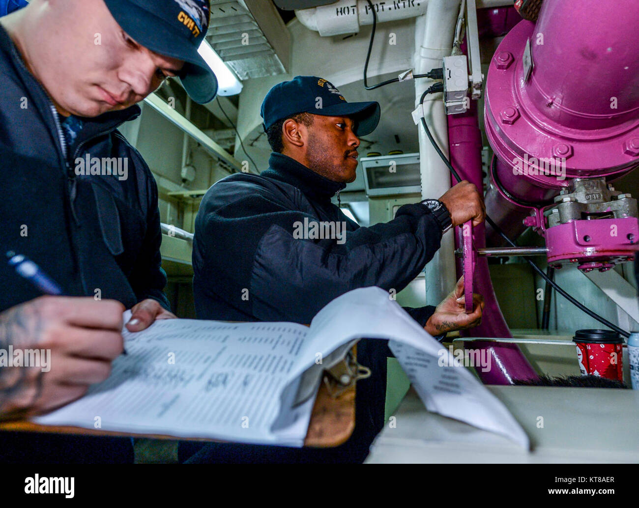Aviation Boatswain’s Mate (Fuels) Airman Gabriel Salinas, left, and ...