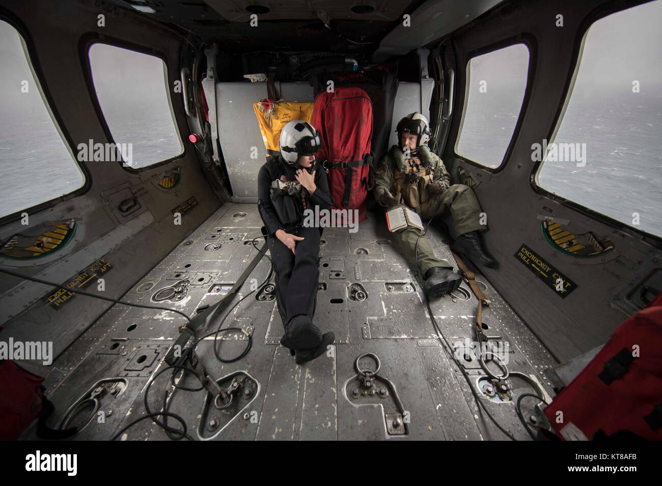 Naval Air Crewman (Helicopter) 2nd Class Matthew Evans (Left) and Naval ...