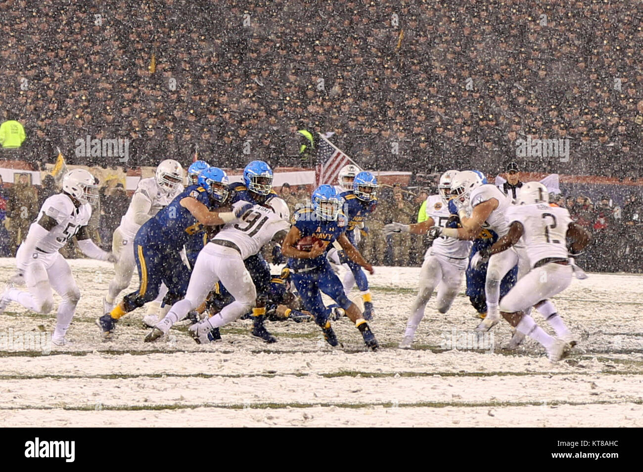 U.S. Navy Midshipman Malcolm Perry carries the ball at Lincoln ...