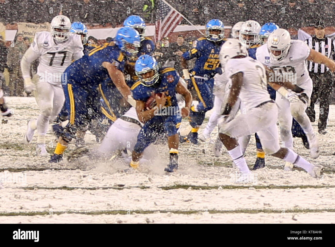 U.S. Navy Midshipman Malcolm Perry carries the ball at Lincoln ...
