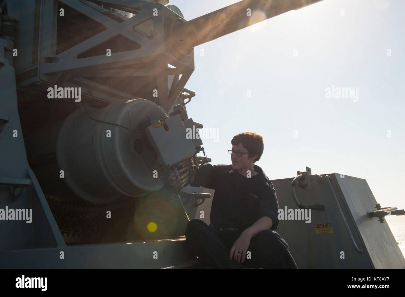 Servicemen at work aboard US navy aircraft carrier Stock Photo - Alamy