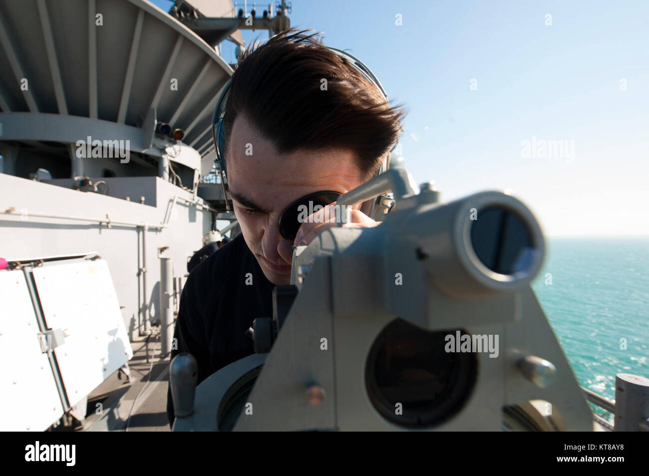 Servicemen at work aboard US navy aircraft carrier Stock Photo - Alamy