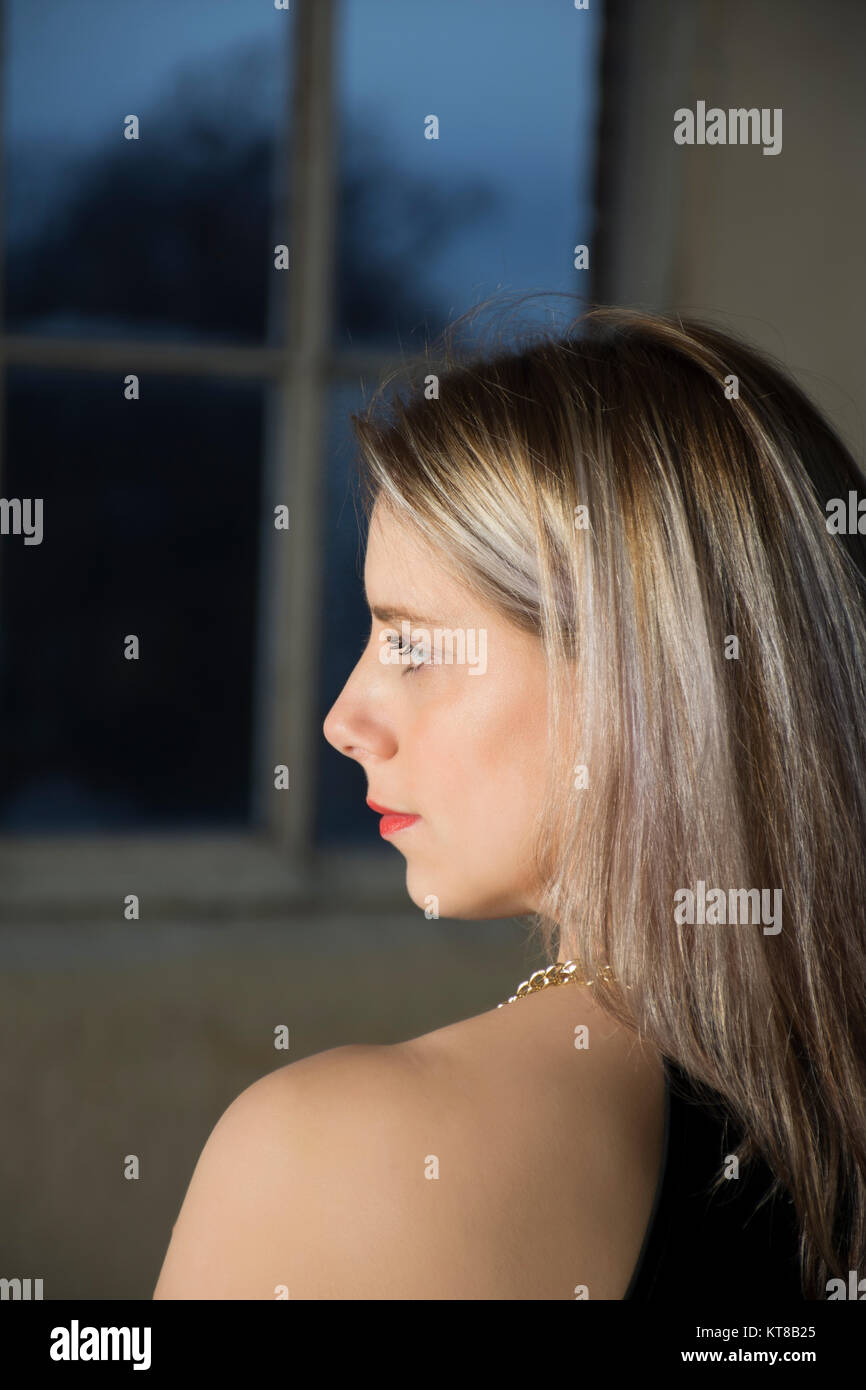 Alarmed woman loking away Stock Photo - Alamy